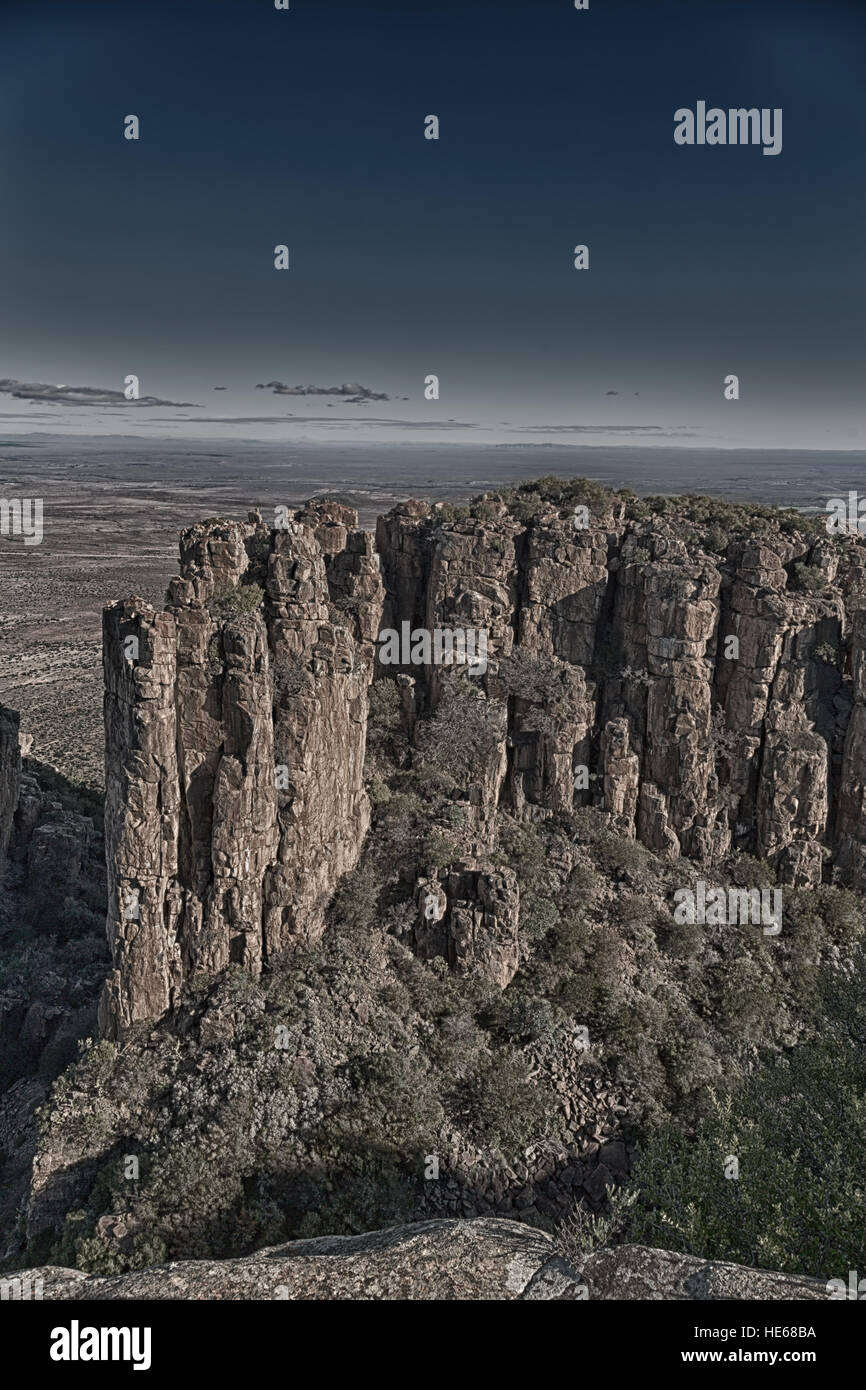 blur in south africa valley of desolation dirty road rock tree and sky ...