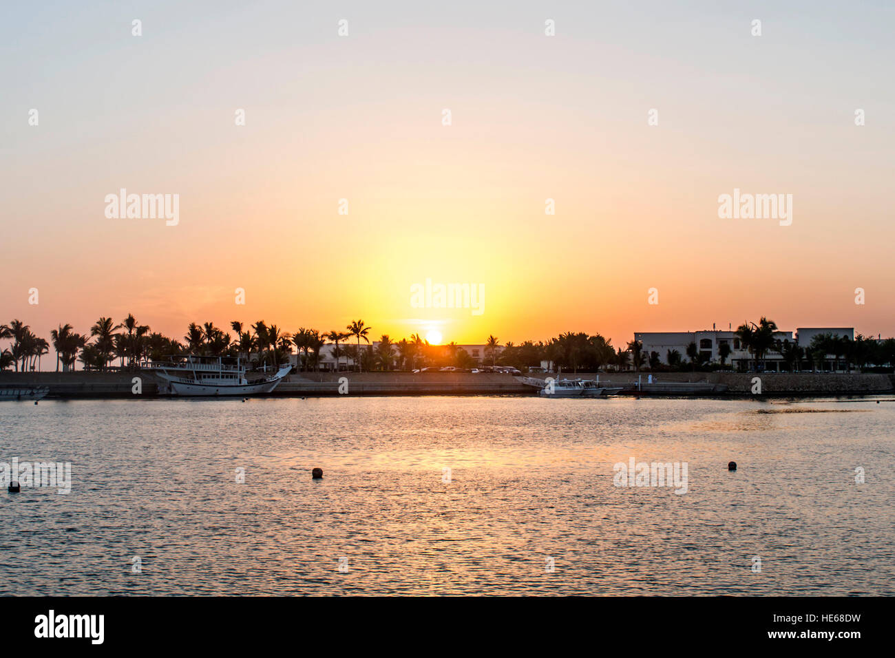 Amazing Sunset in Sultanate Oman at Souly Bay harbour and Hotels ...