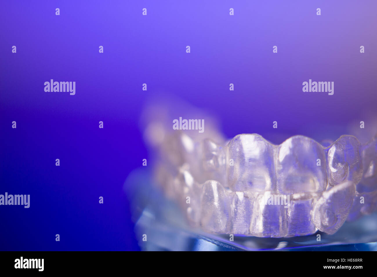 Transparent dental orthodontics for adults and children Stock Photo - Alamy