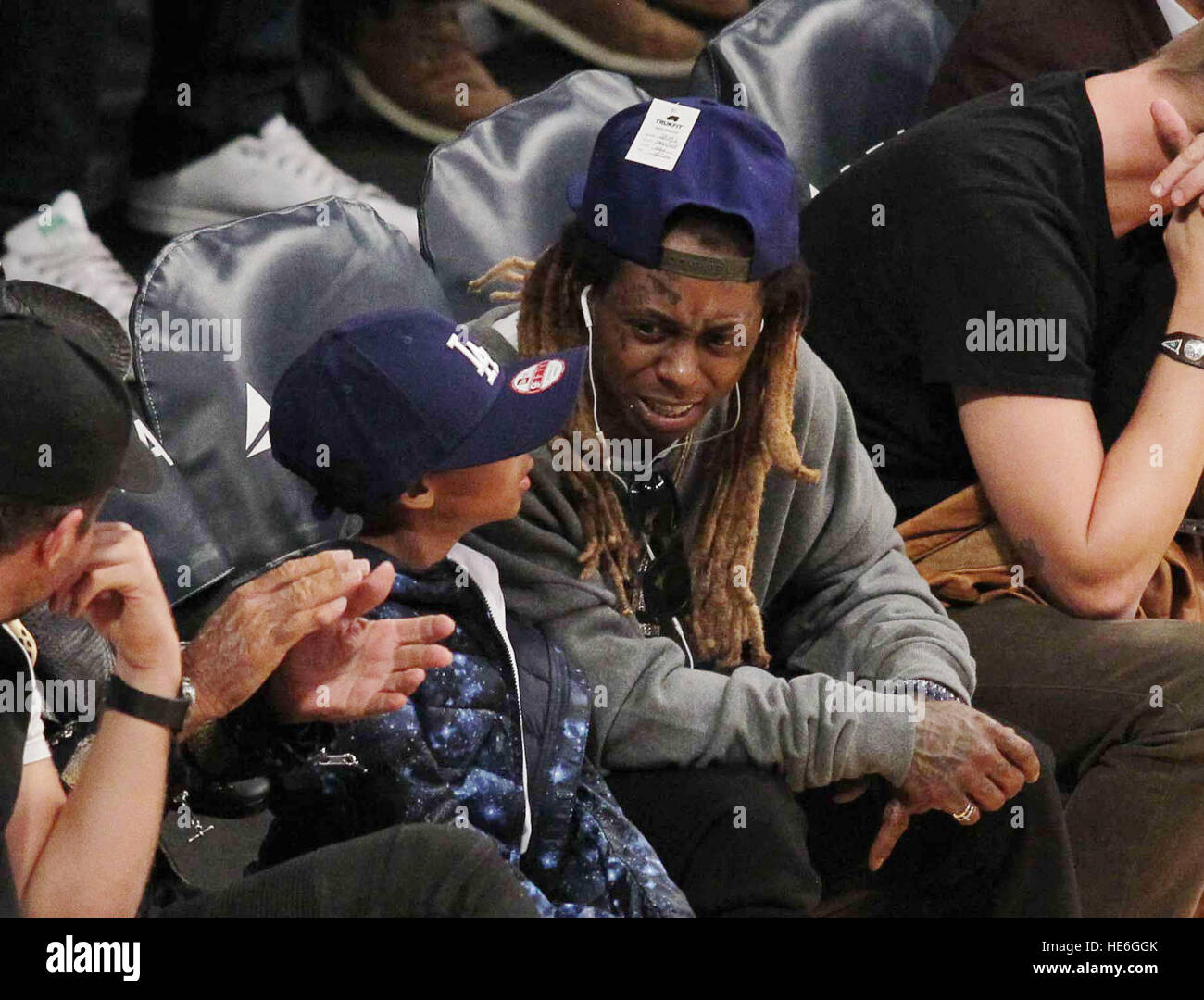 Lil Wayne at the Los Angeles Lakers game with his son. The Los Angeles ...