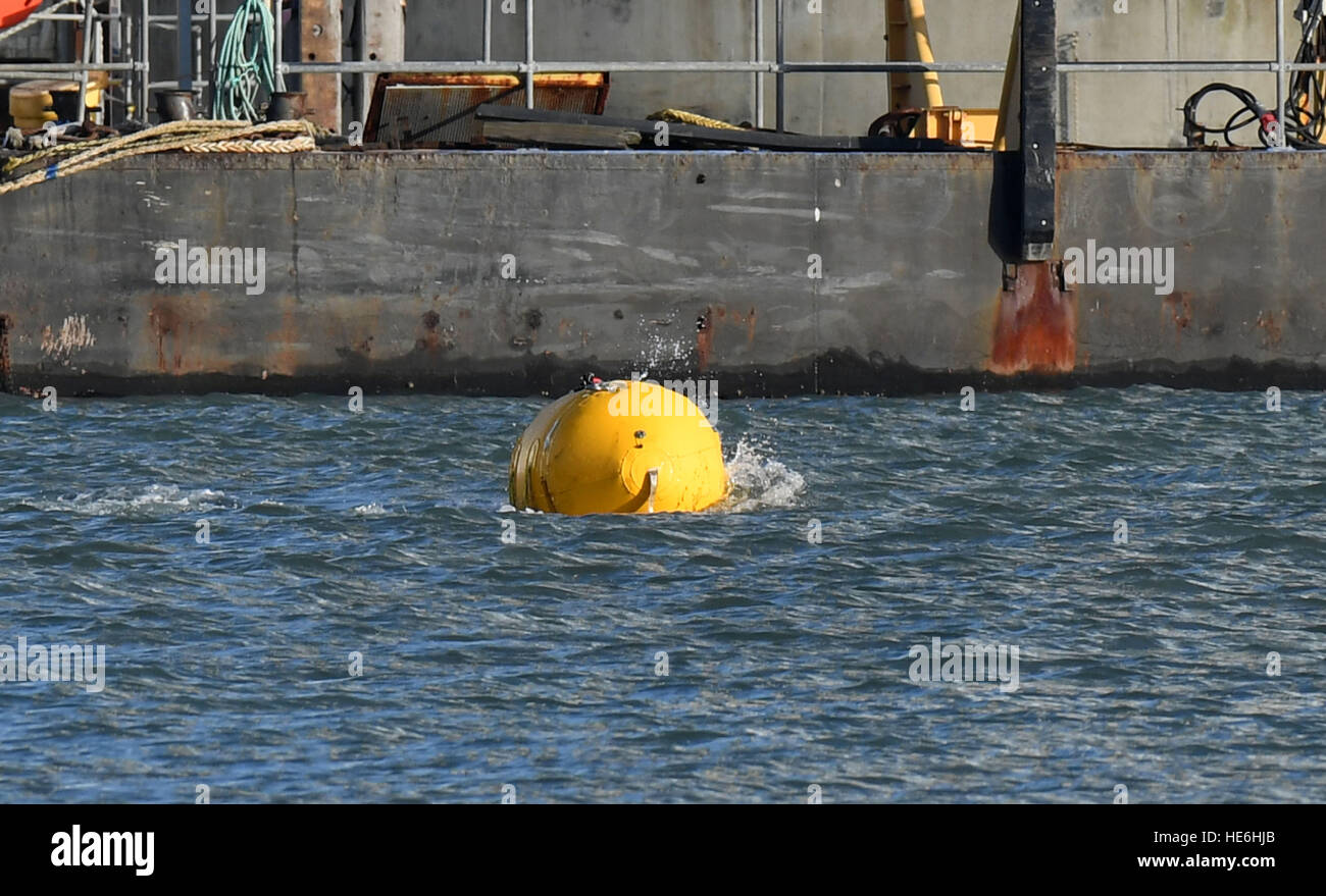 Royal Navy bomb squad and divers tow out a 500lb German bomb from ...