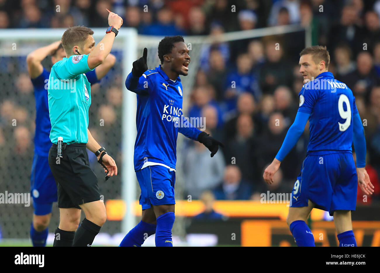 Leicester City's Jamie Vardy (right) is shown the red card by referee ...