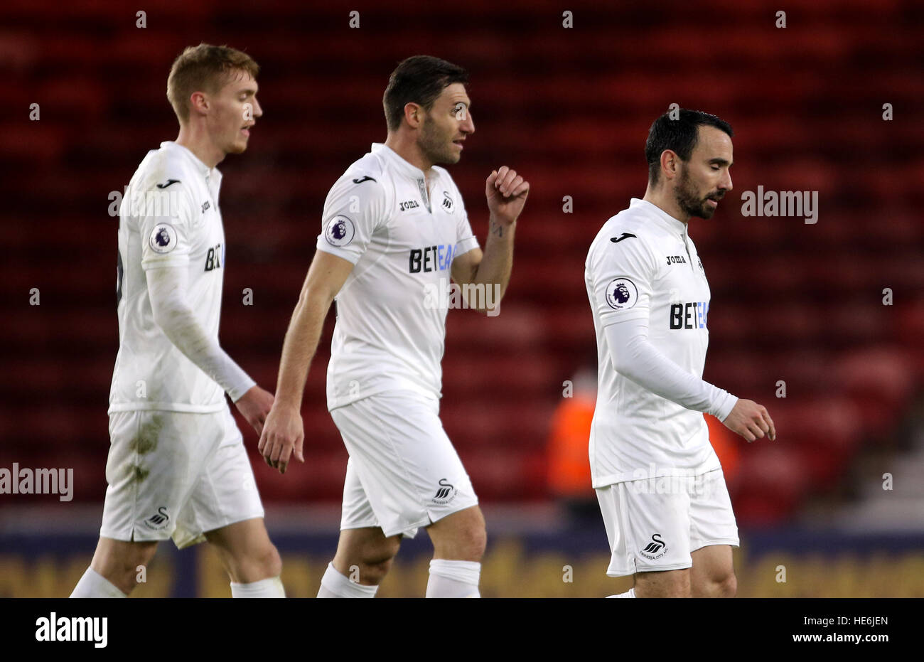 Swansea City's Jay Fulton (left), Angel Rangel (centre) and Leon ...