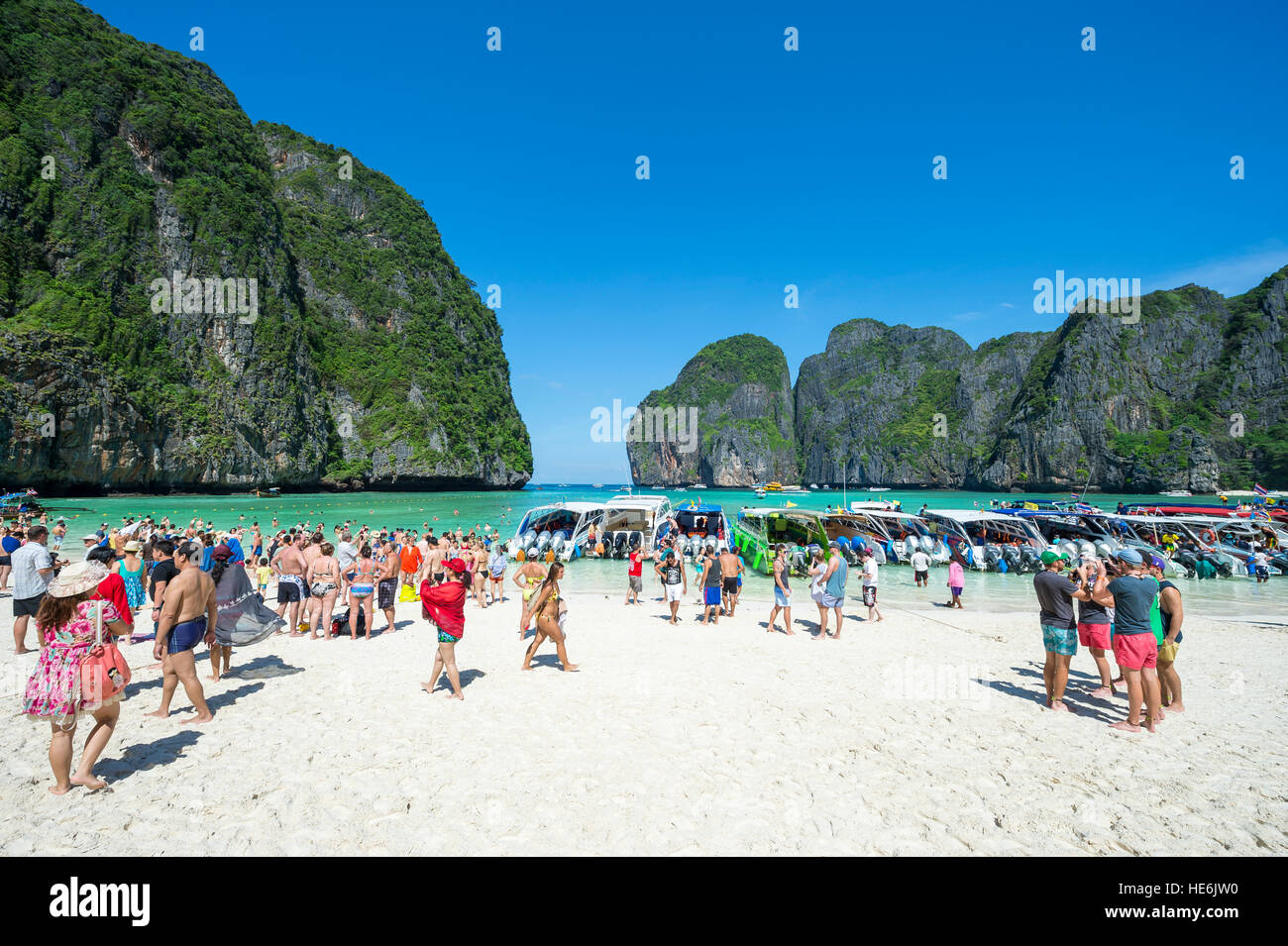 MAYA BAY, THAILAND - NOVEMBER 12, 2014: Crowds of sunbathing visitors ...