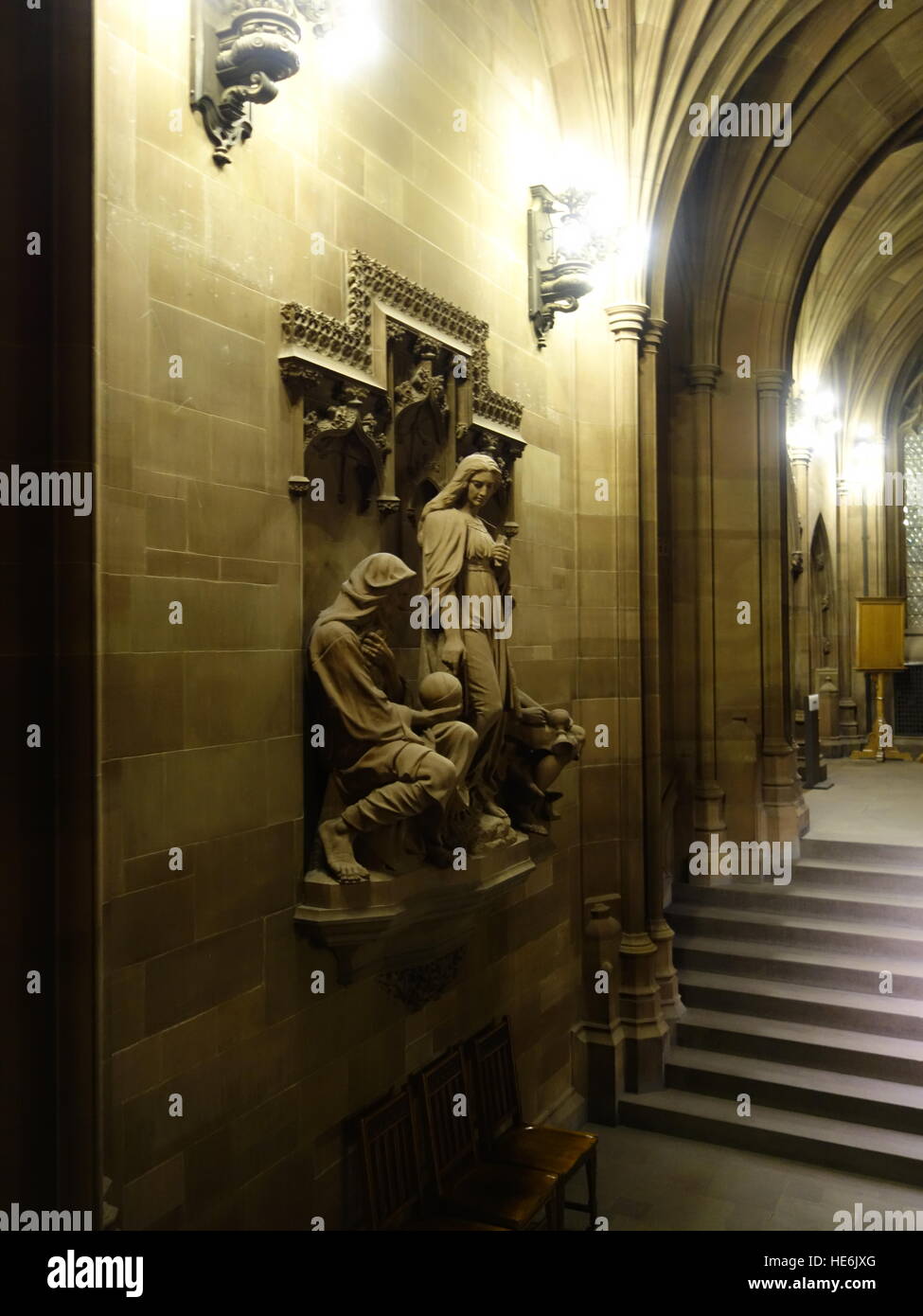 A corridor with an old statue and lighting Stock Photo - Alamy