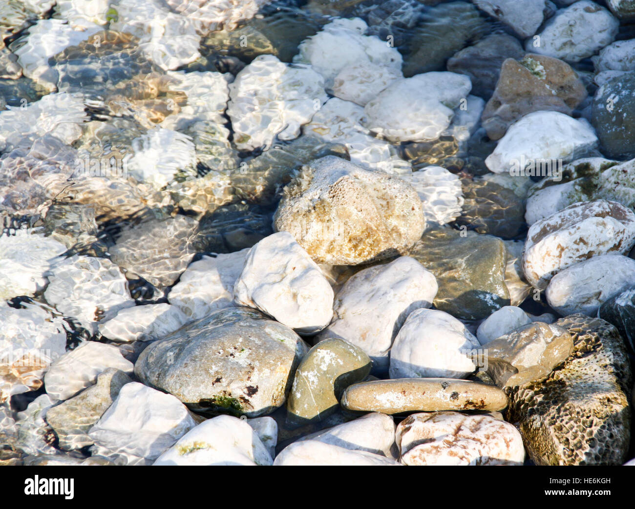 Pebbles in the sea Stock Photo - Alamy