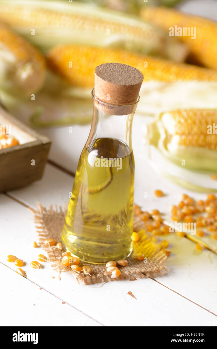 corn oil in the bottle with the cobs around Stock Photo - Alamy