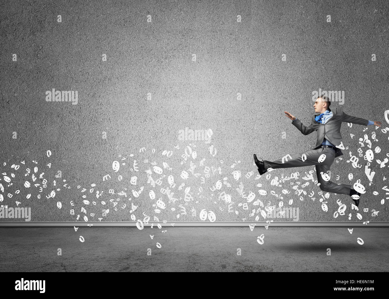 Businessman jumping high Stock Photo - Alamy