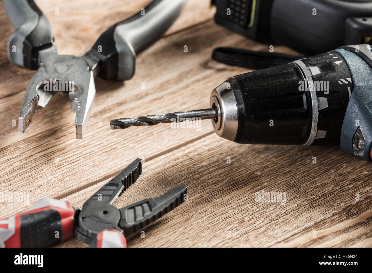 Carpentry tools on wooden surface Stock Photo - Alamy