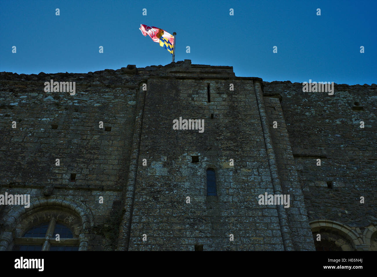 Flag on top of castle Stock Photo - Alamy