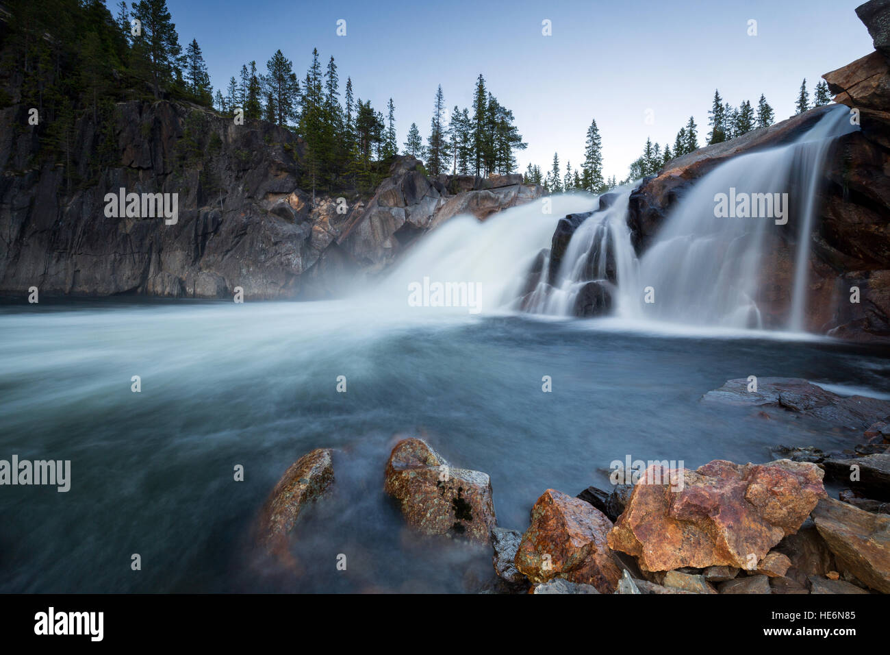 Hyttfossen waterfall on Gaula river. Norwegian outdoors. Evening time ...