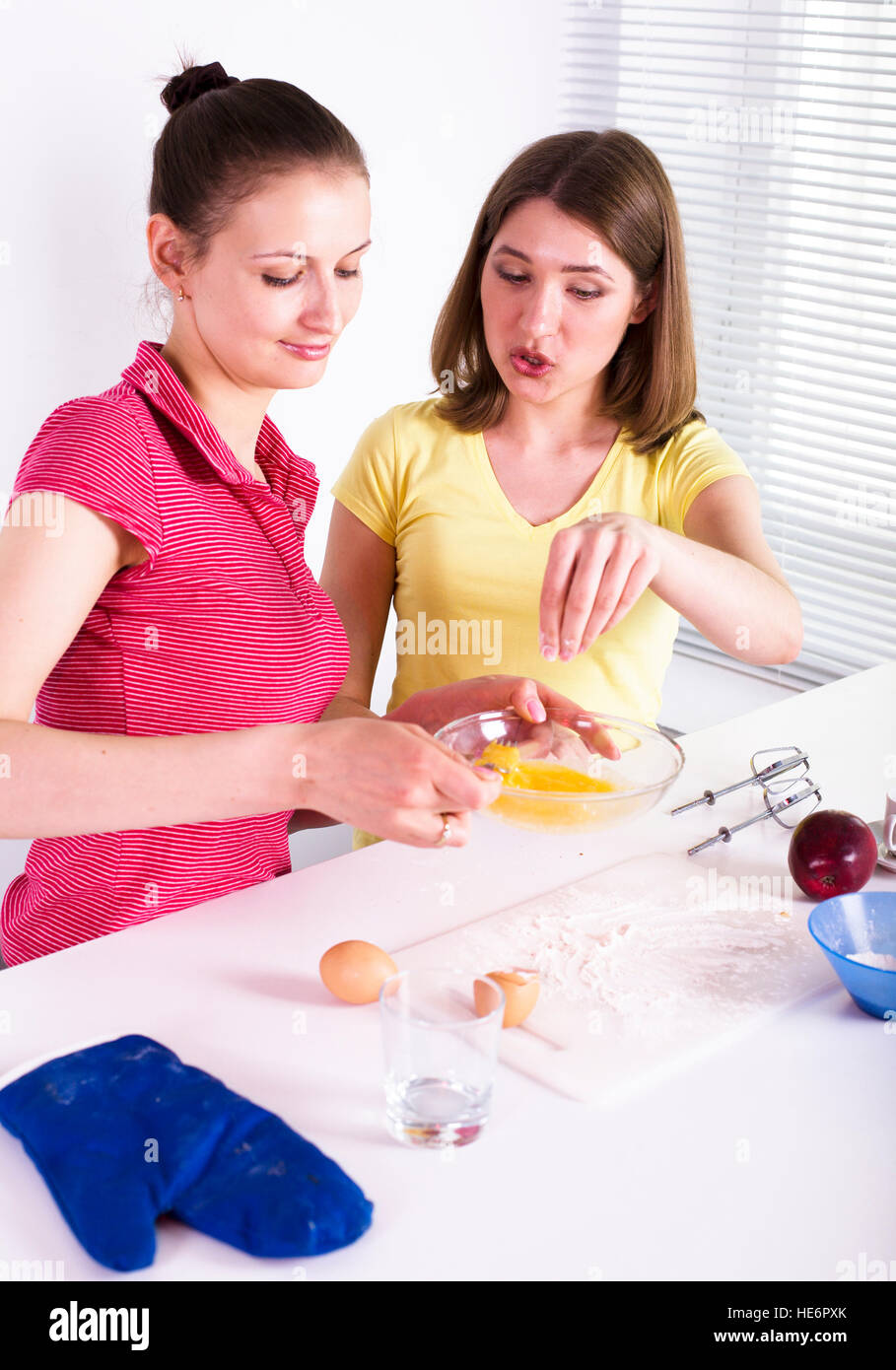 two woman friend cooking food together, having fun, happy friendship ...