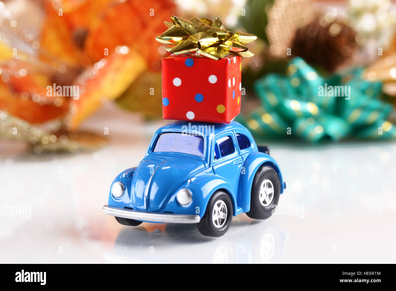 gift package on the small blue car Stock Photo - Alamy