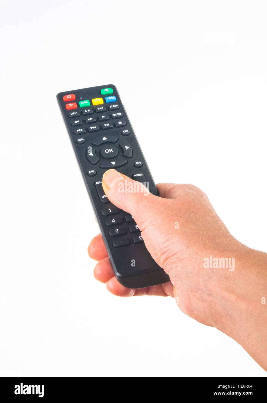 hand holding a remote control on white background Stock Photo - Alamy
