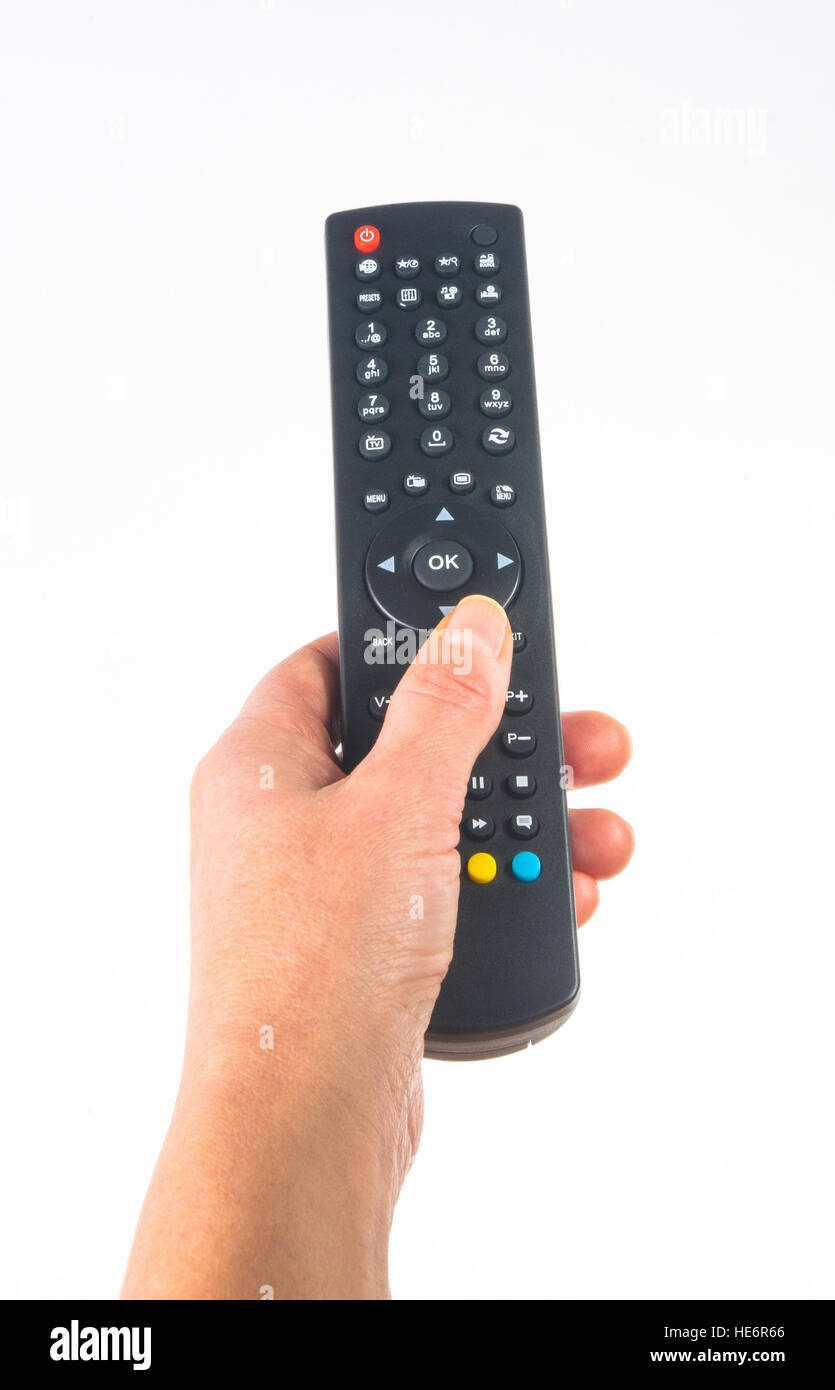 hand holding a remote control on white background Stock Photo - Alamy