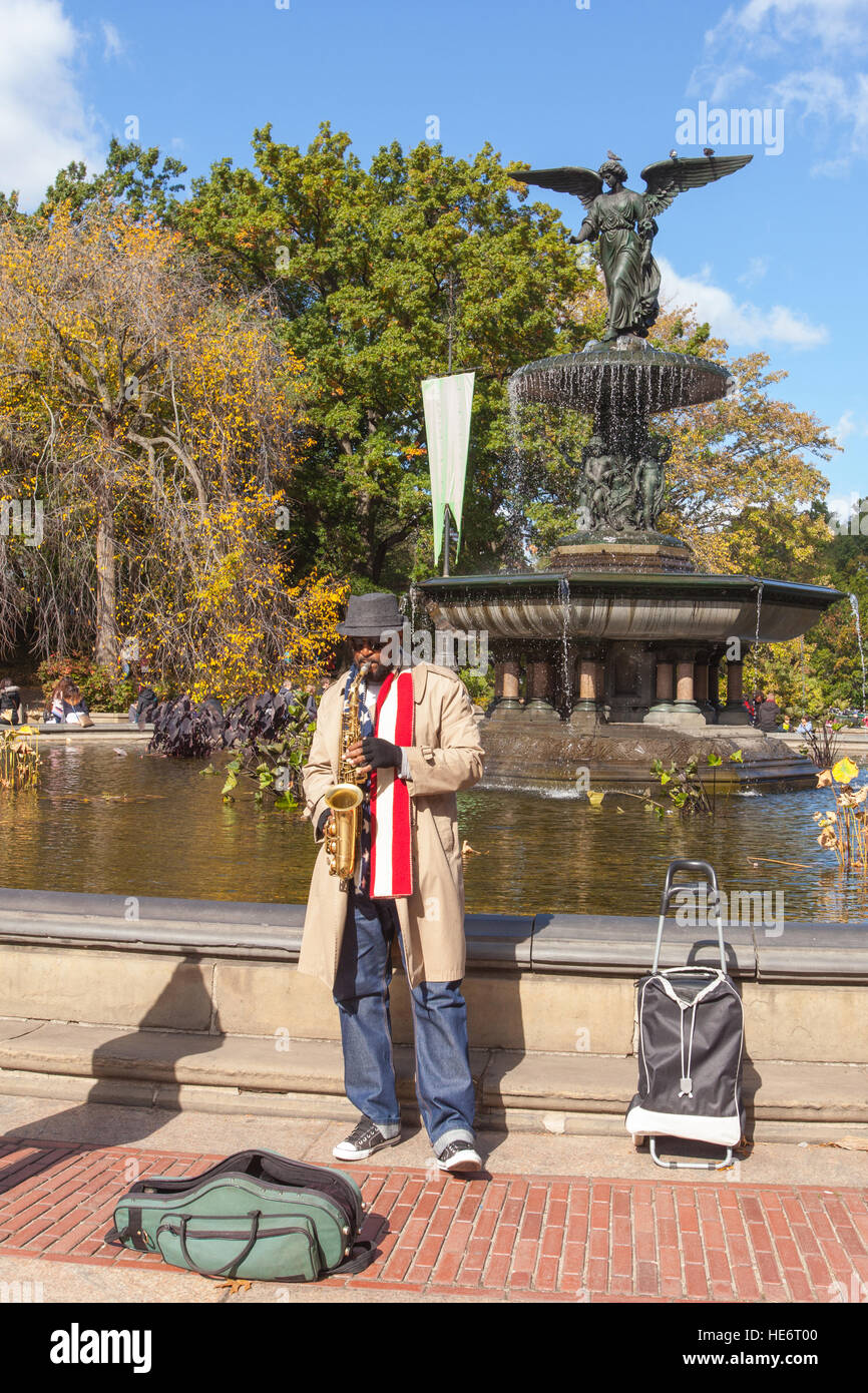 Busker playing a saxophone at Bethesda Fountain, Bethesda Terrace ...