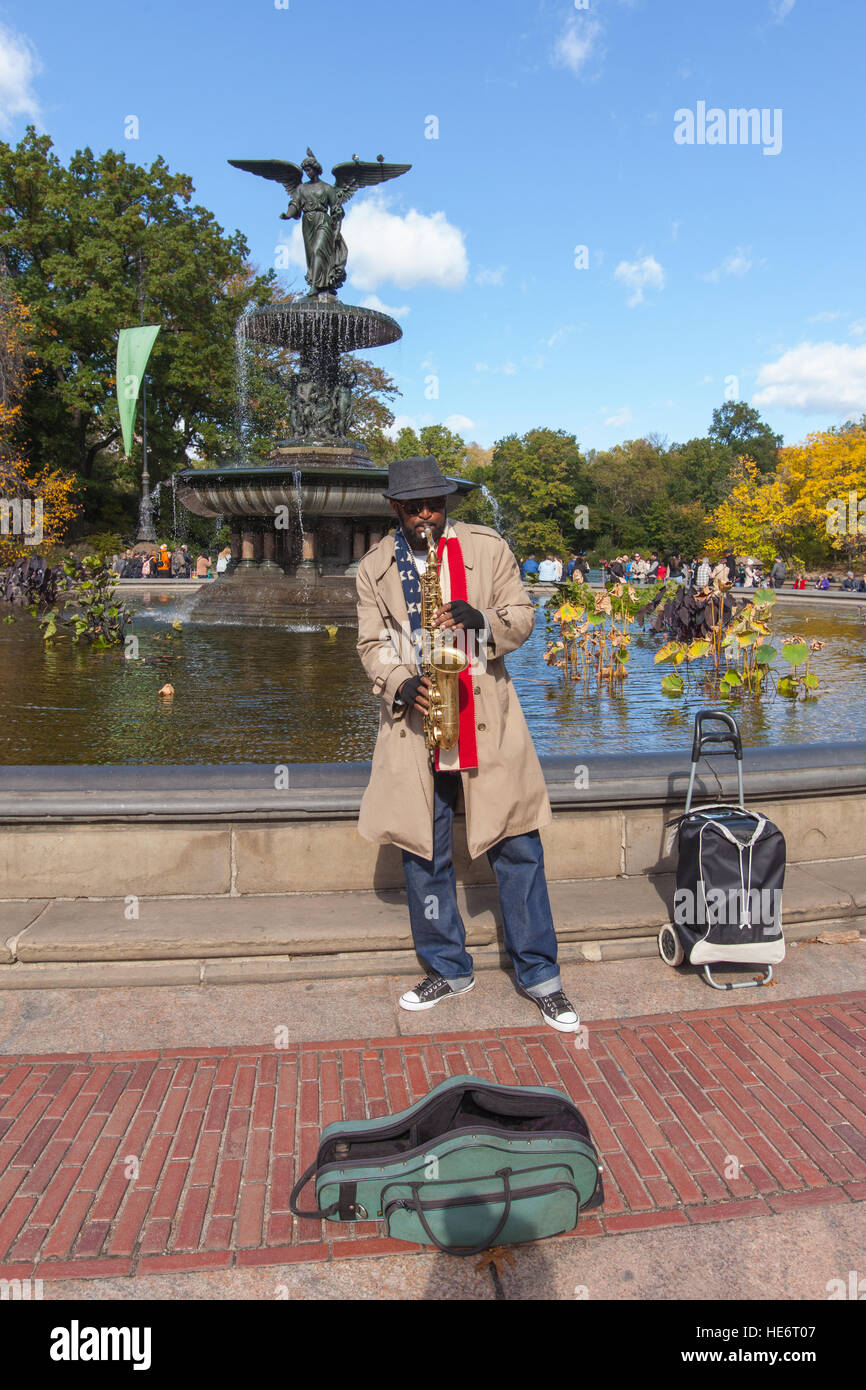 Busker playing a saxophone at Bethesda Fountain, Bethesda Terrace ...