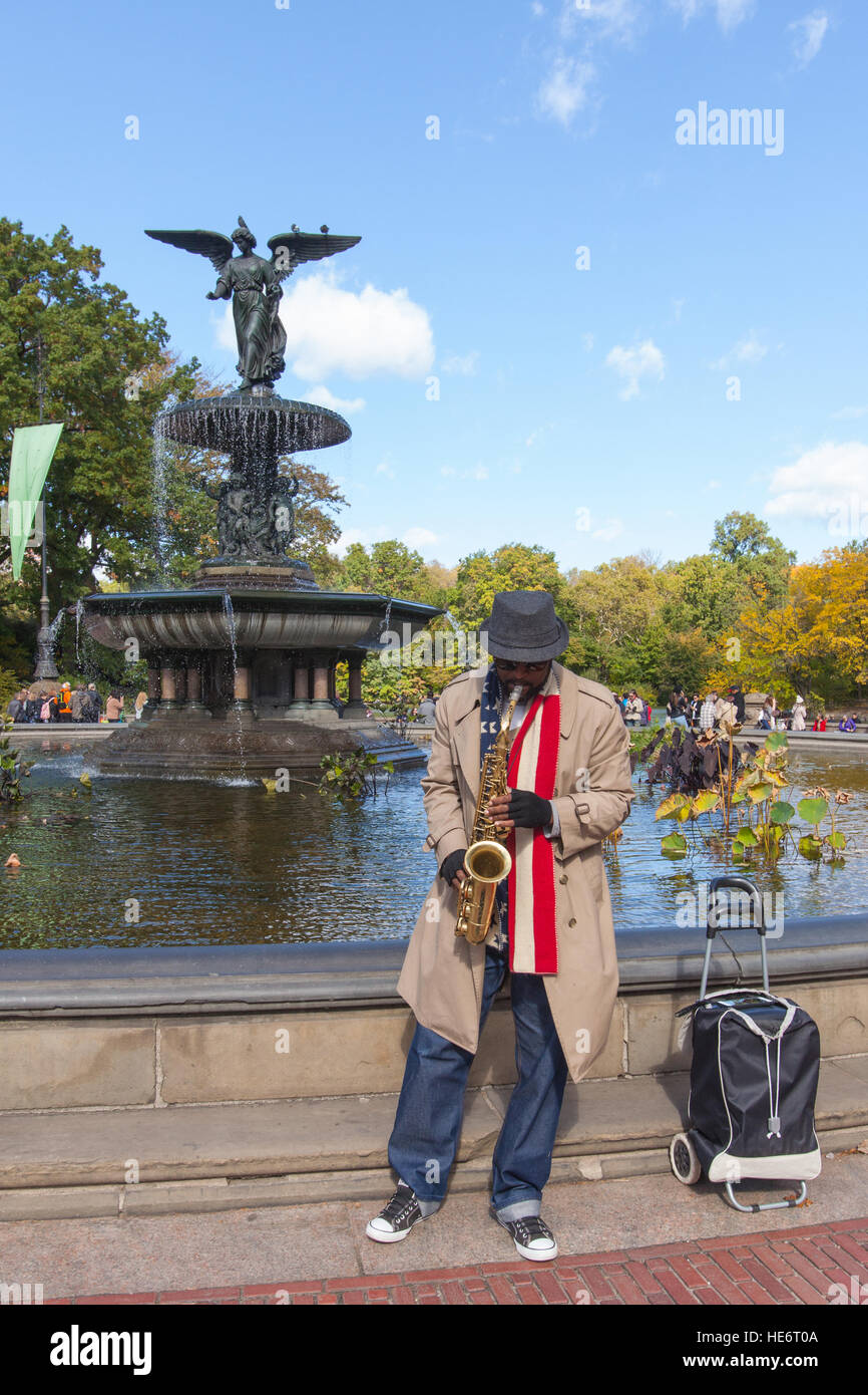 Busker playing a saxophone at Bethesda Fountain, Bethesda Terrace ...