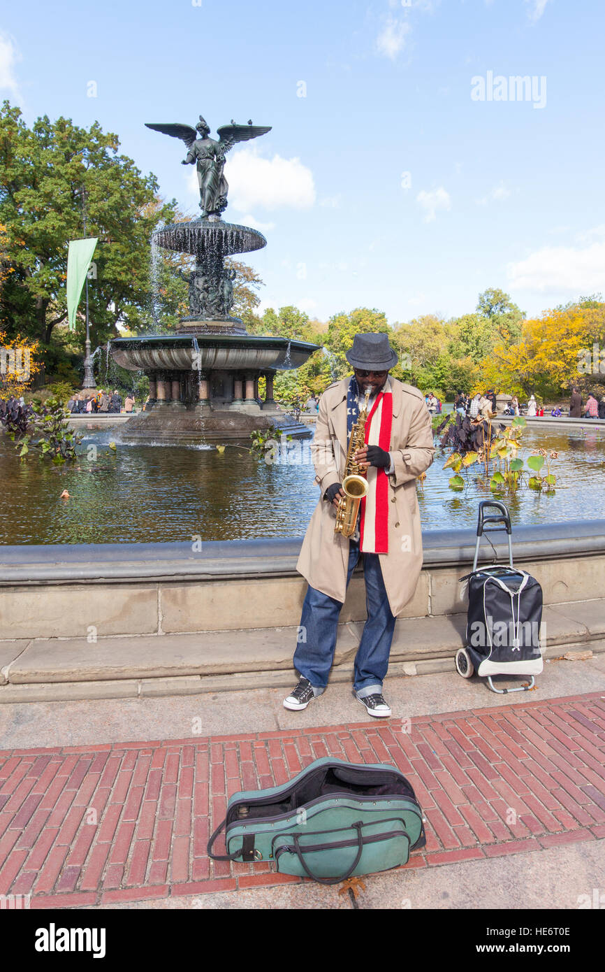 Busker playing a saxophone at Bethesda Fountain, Bethesda Terrace ...