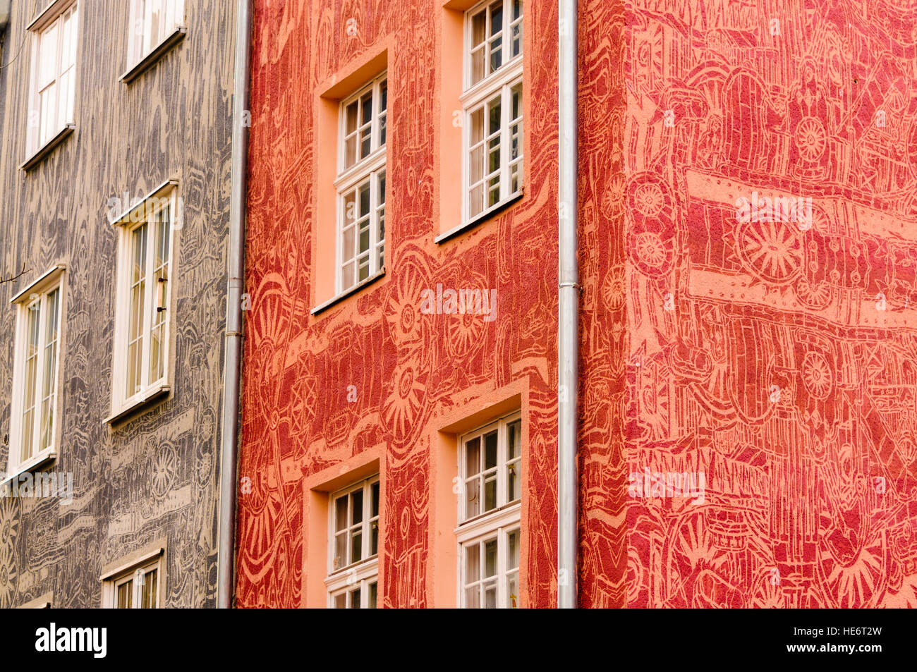 Buildings with ornate murals painted on their outsides in Gdansk ...