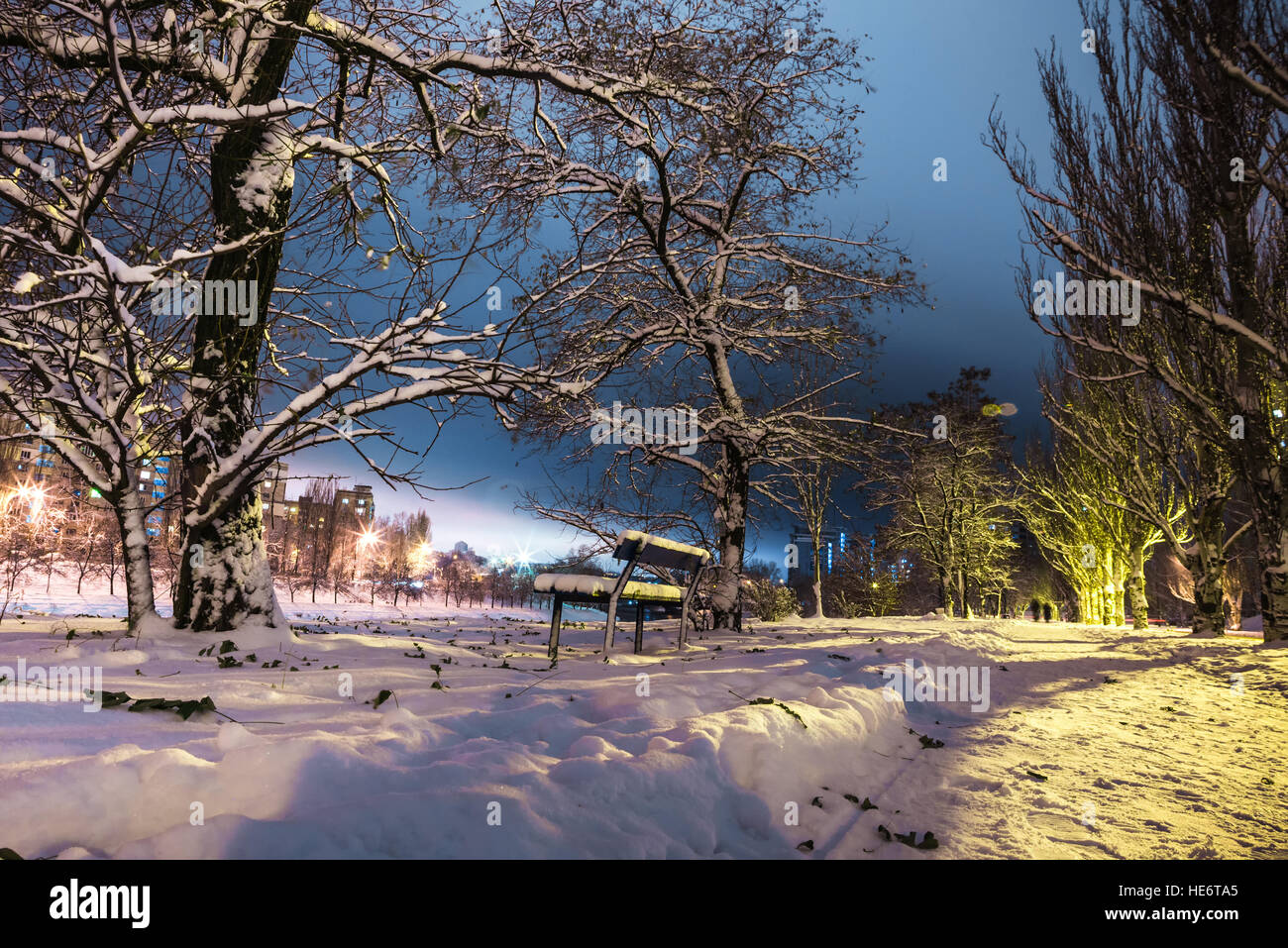 Snow falling on background street hi-res stock photography and images ...