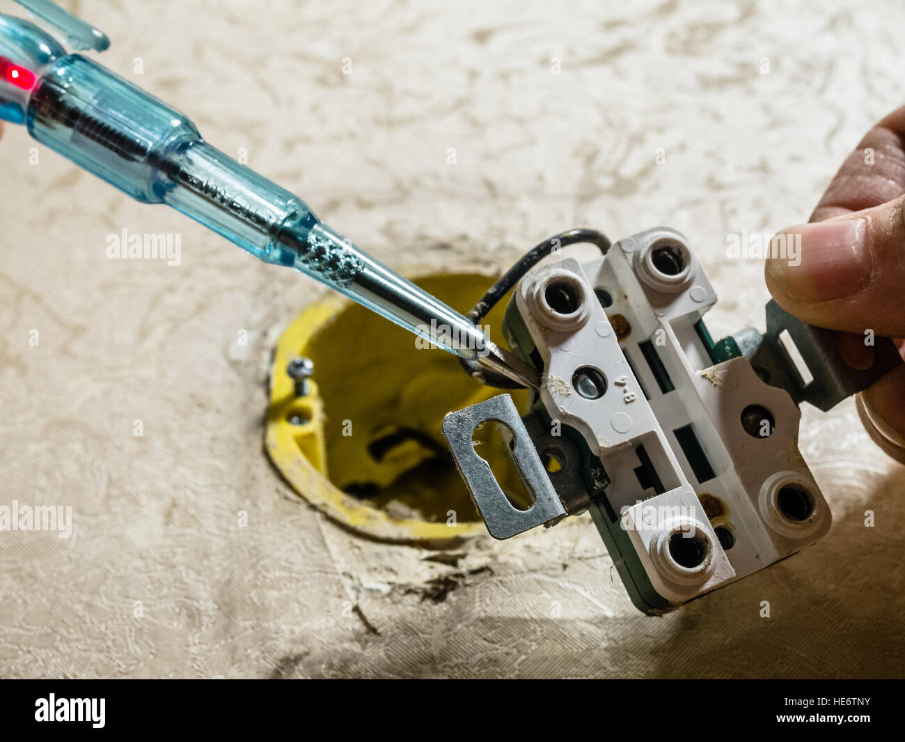 Installing socket hi-res stock photography and images - Alamy
