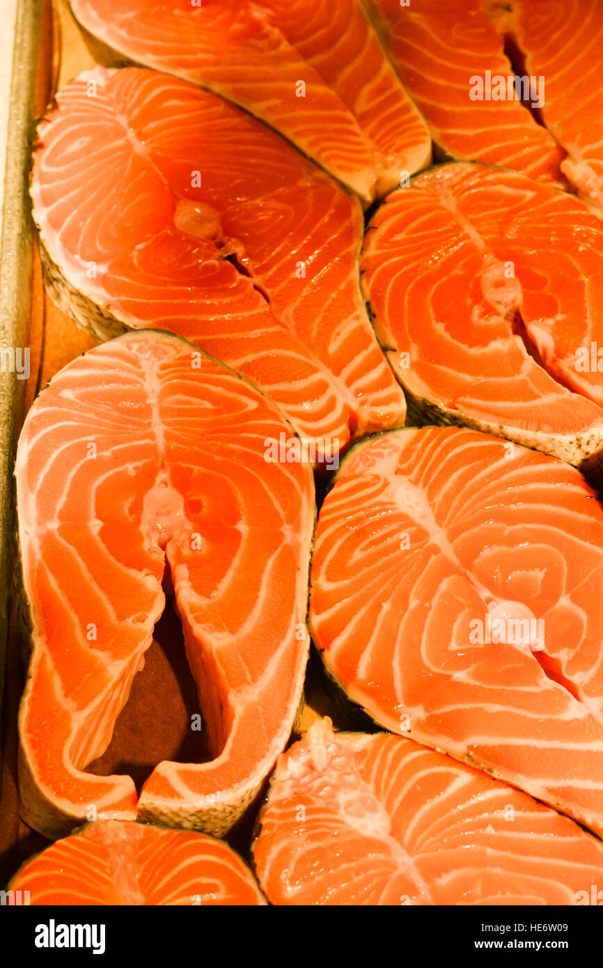 Raw Pink salmon fillet chunks at fish market Stock Photo - Alamy
