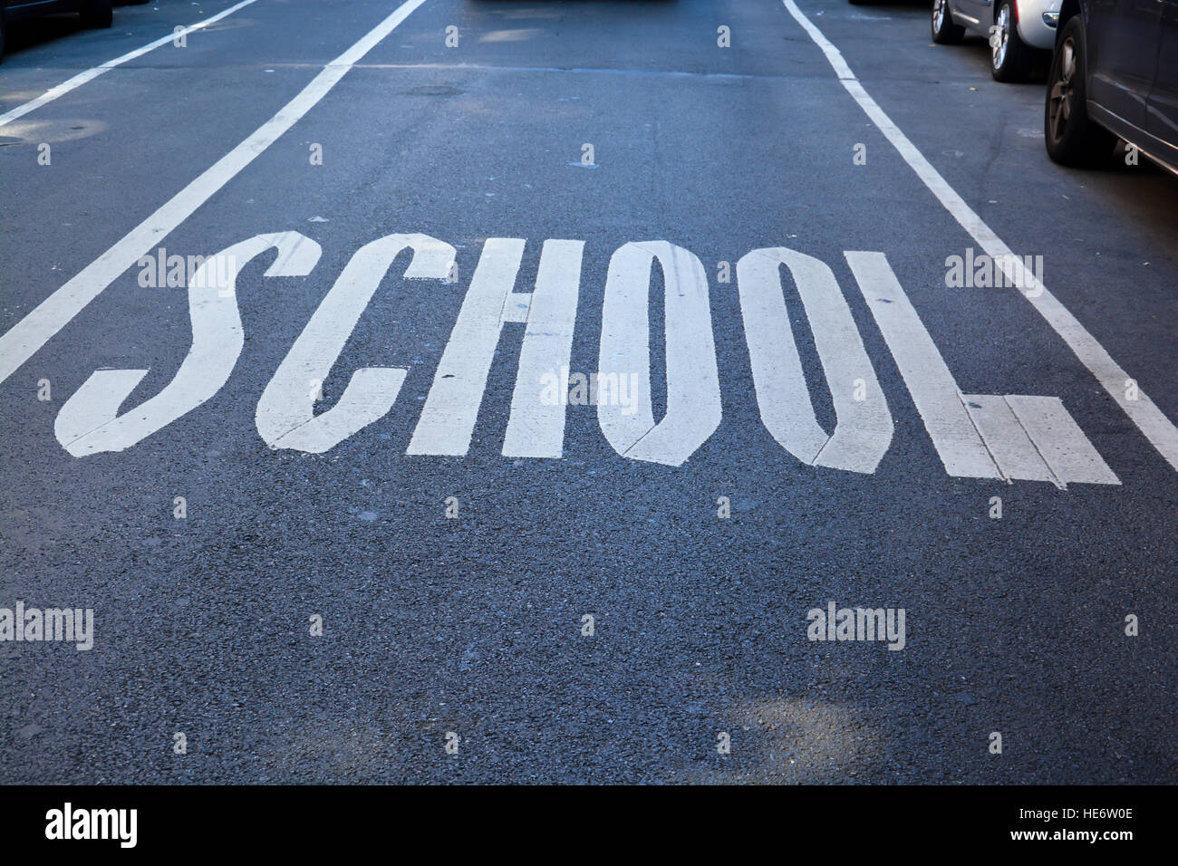 School written on asphalt Stock Photo - Alamy
