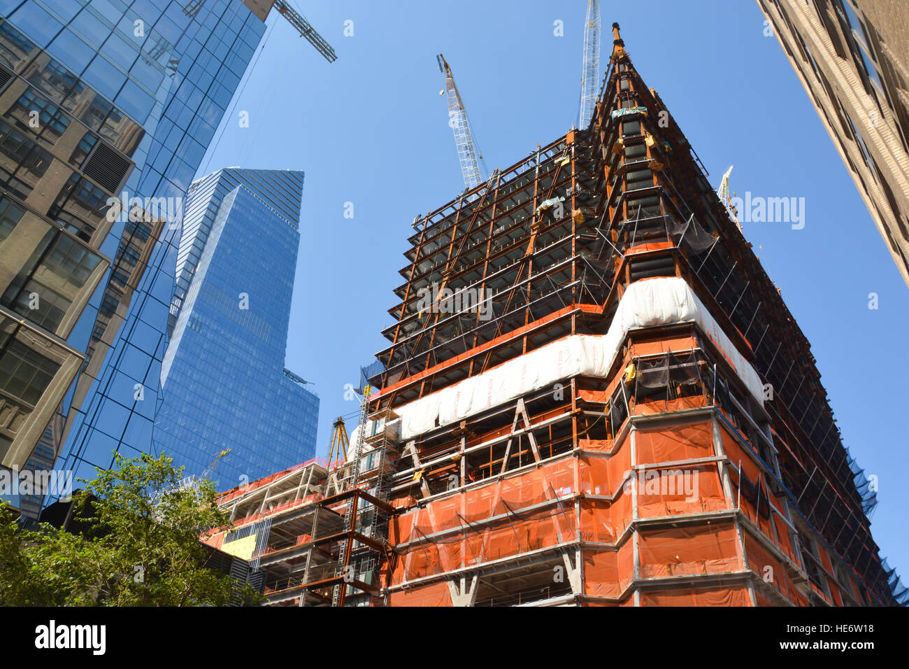Skyscraper under construction urban area against blue sky Stock Photo ...