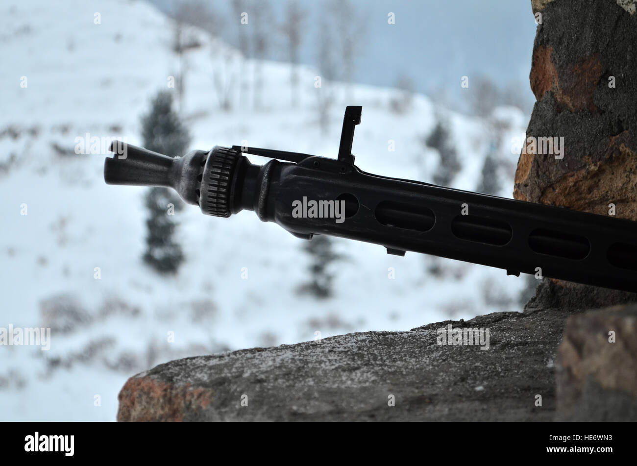 A gun barrel coming out of the bunker Stock Photo - Alamy