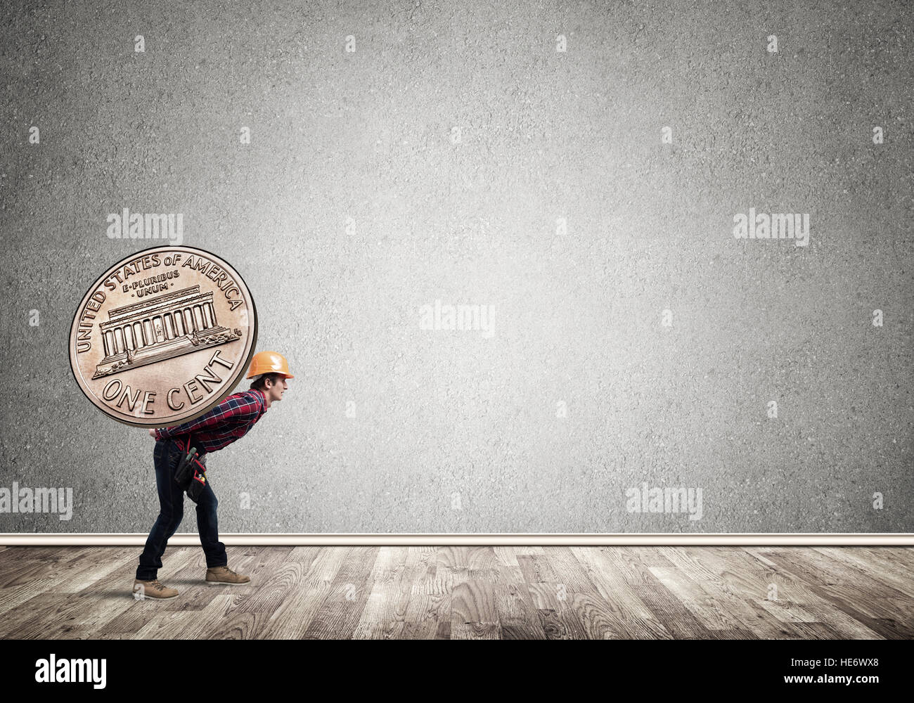 Builder man carry coin Stock Photo - Alamy