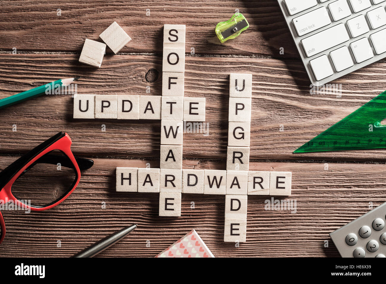 Conceptual media keywords on table with elements of game making ...