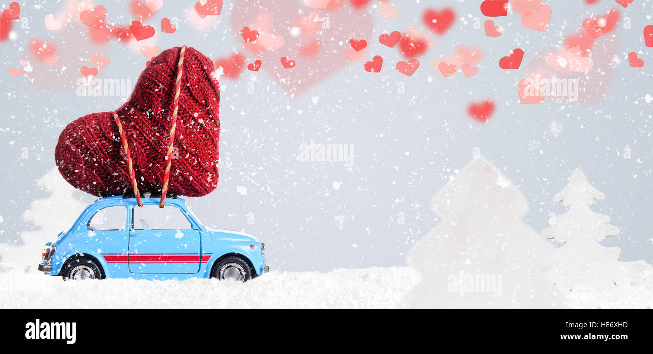 Retro toy car with Valentine heart Stock Photo - Alamy