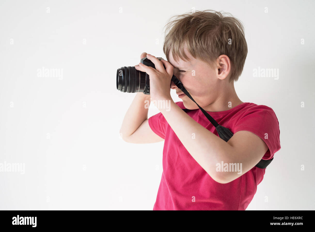 Boy with a camera Stock Photo - Alamy