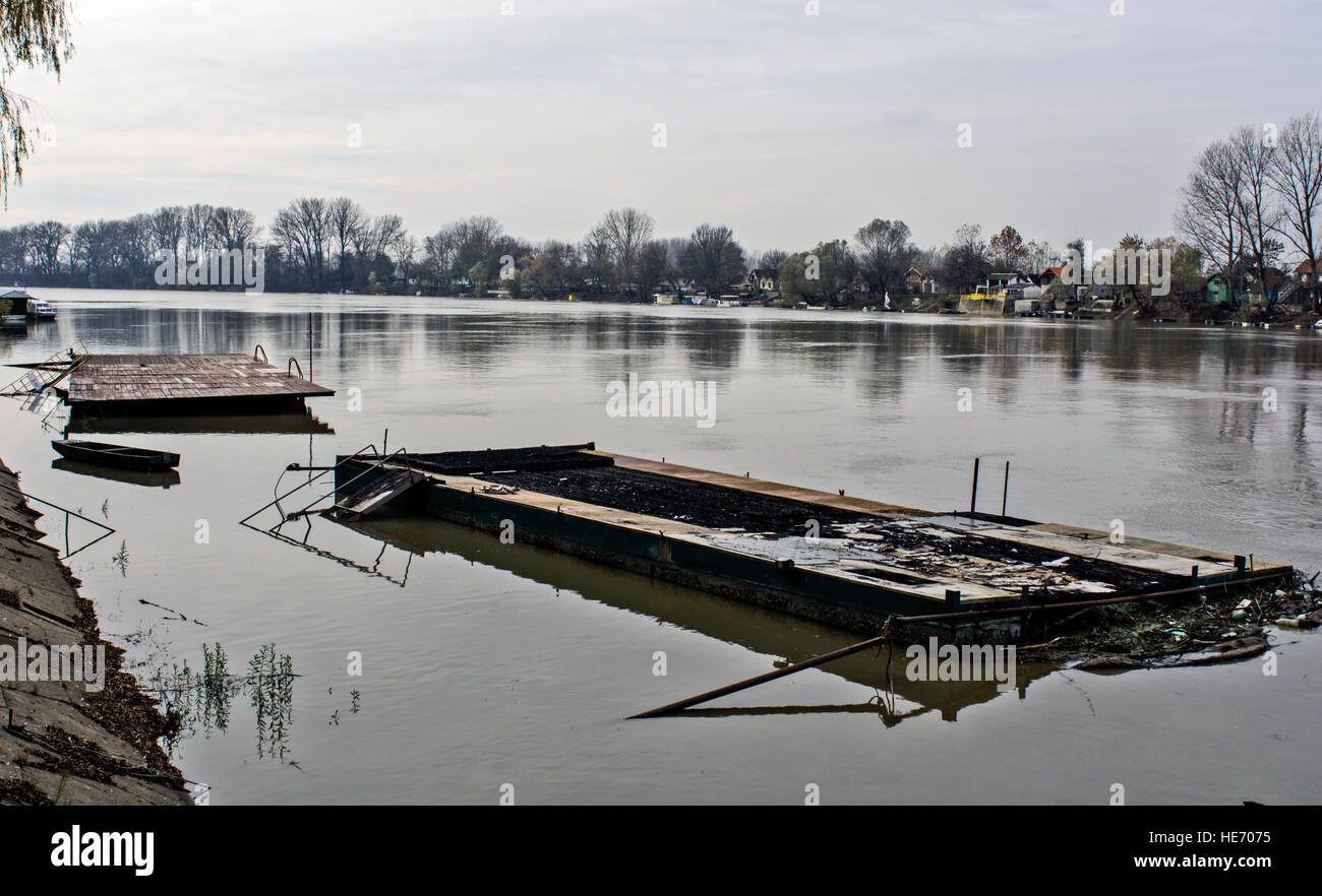 Two pontoons on a big river and a boat Stock Photo - Alamy