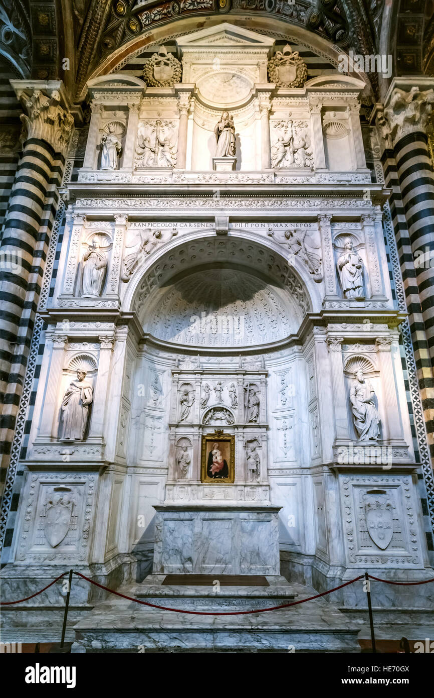 The sculptural altarpiece in Duomo di Siena. Siena Cathedral is a ...