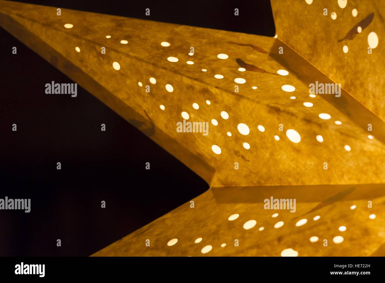 Orange golden star peaks on black background. Macro closeup of a ...