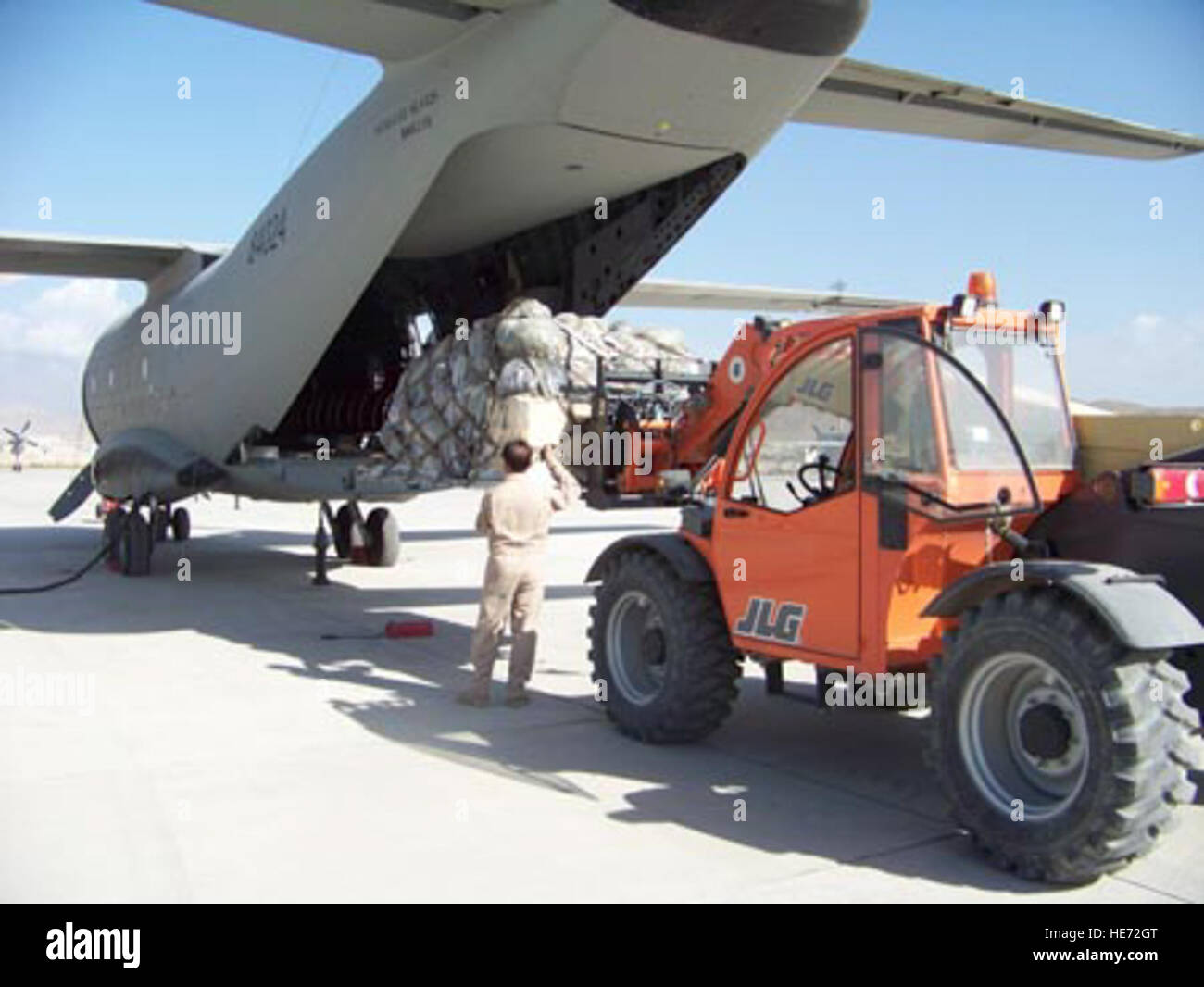 Afghan National Army Air Force soldier Inudin Safi loads a cargo pallet ...