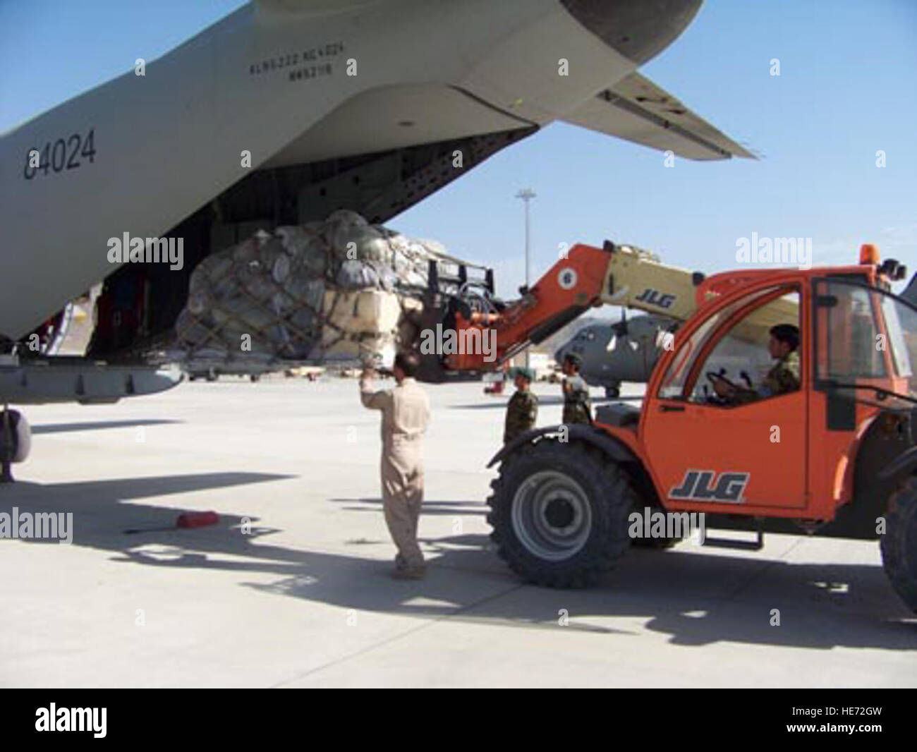 Afghan National Army Air Force soldier Inudin Safi loads a cargo pallet ...