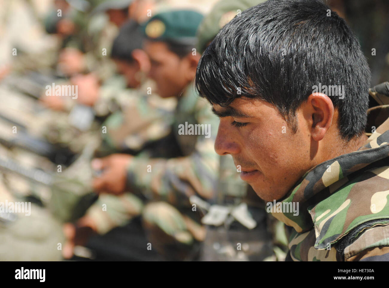 Afghan National Army soldiers load M-16 magazines during the infantry ...