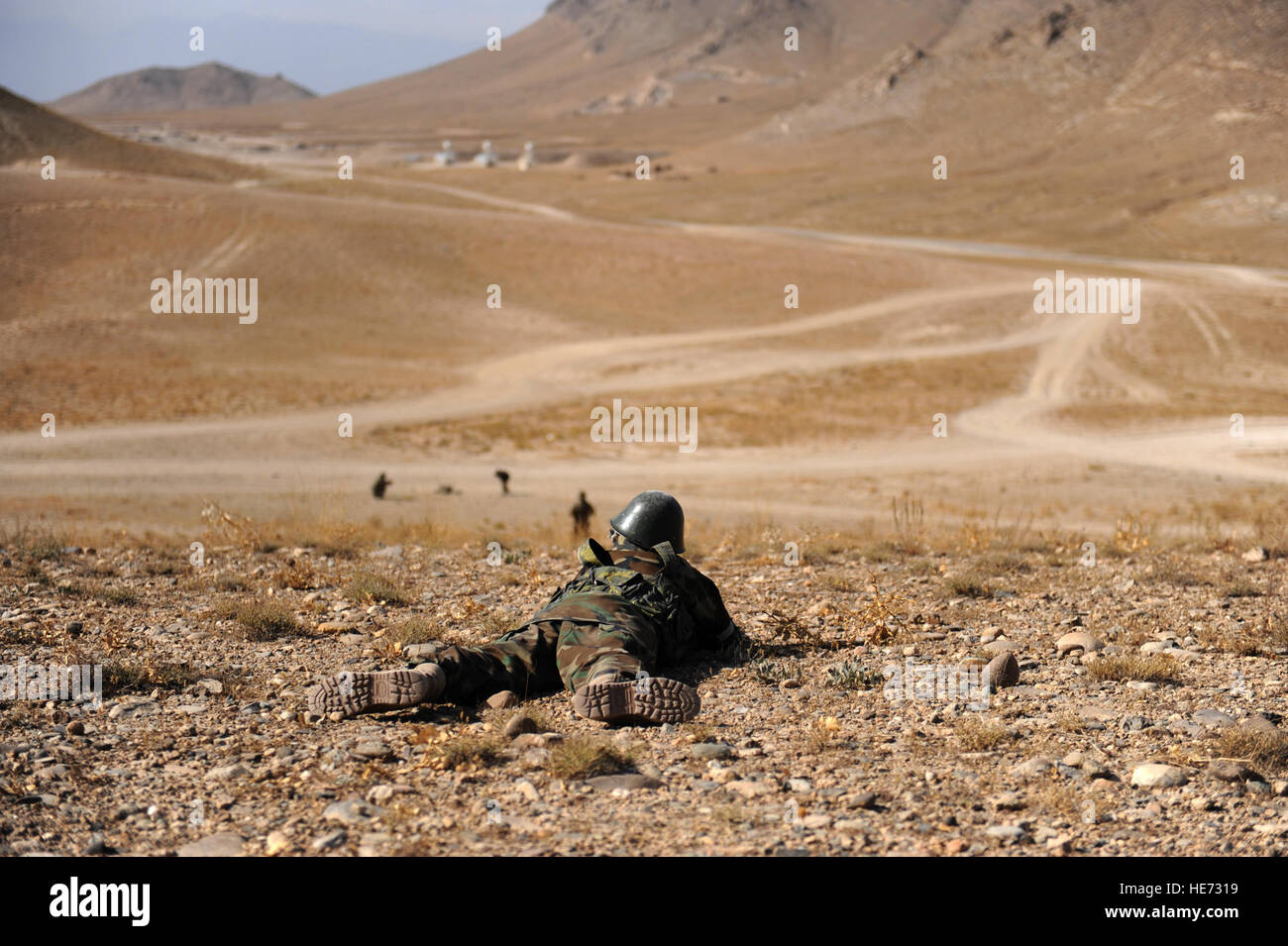 An Afghan National Army trainee guards the range during a training ...