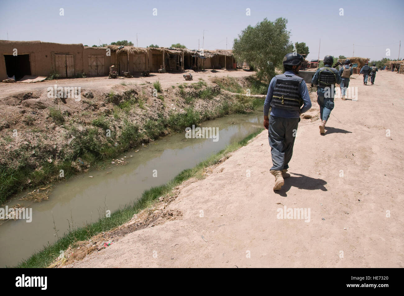 100621-F-1020B-041 Marjah - Afghan National Civil Order Police patrol a ...