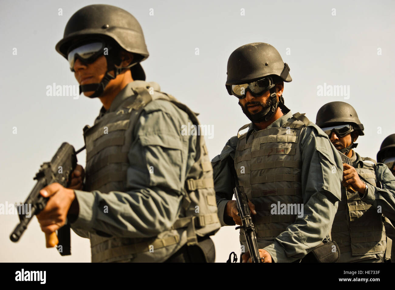 Afghan national policemen demonstrate their tactical maneuvers at the ...