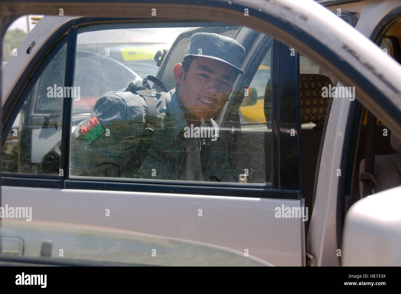 100605-F-1020B-001 Kabul - An Afghan National Police officer searches ...