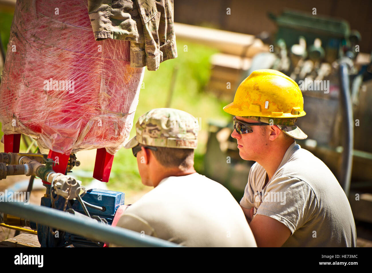 (Front right to left) Senior Airmen Jared Chapman and Benjamin Frazier ...