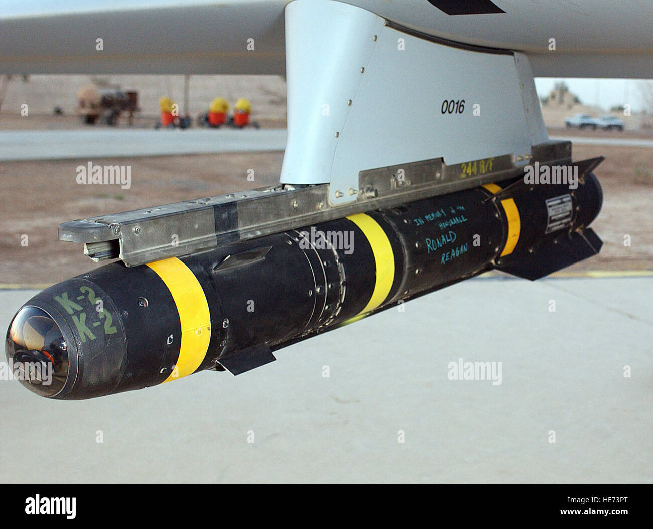 An AGM-114 Hellfire missile hung on the rail of an US Air Force (USAF ...