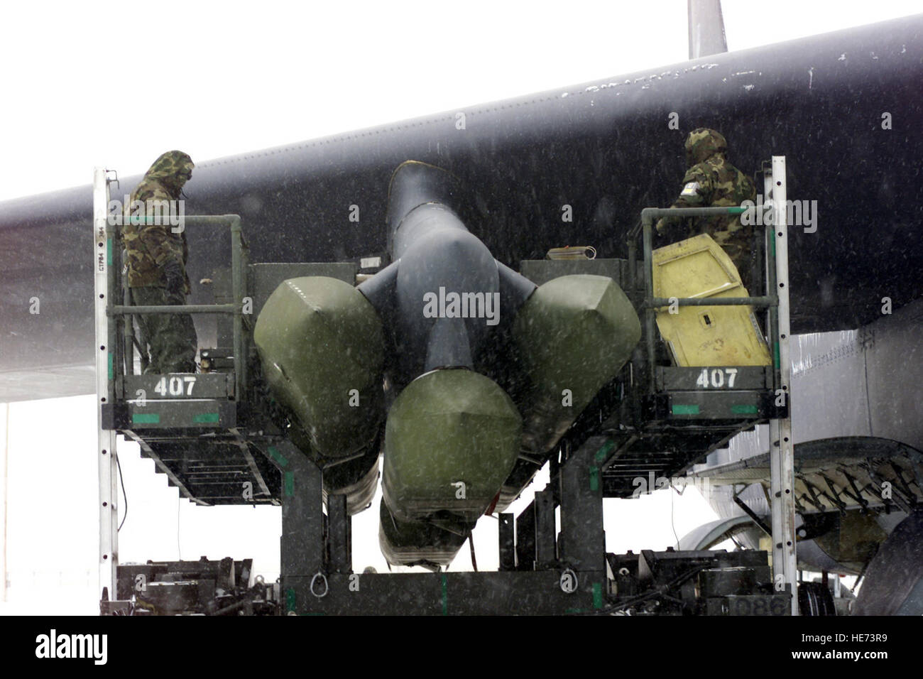 U.S. Air Force personnel of the 23rd Bomb Wing use a pylon maintenance ...