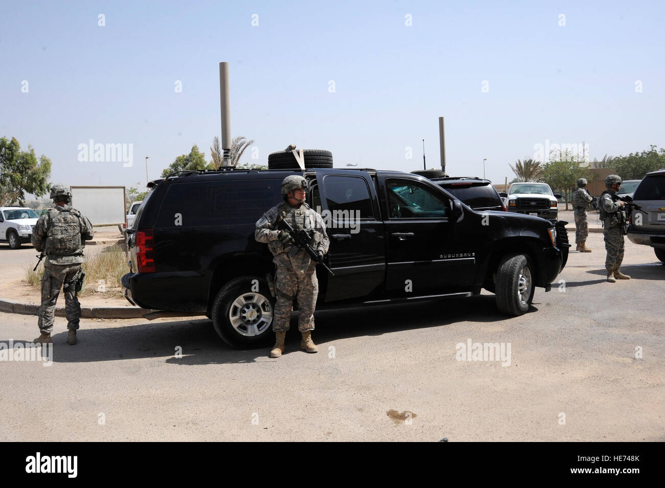 BAGHDAD, Iraq – A Personal Security Detail posts area security before ...