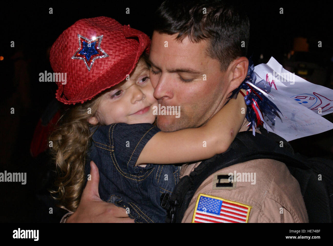 Capt. Michael Capozzi, a pilot with the 7th Airlift Squadron, gets a ...