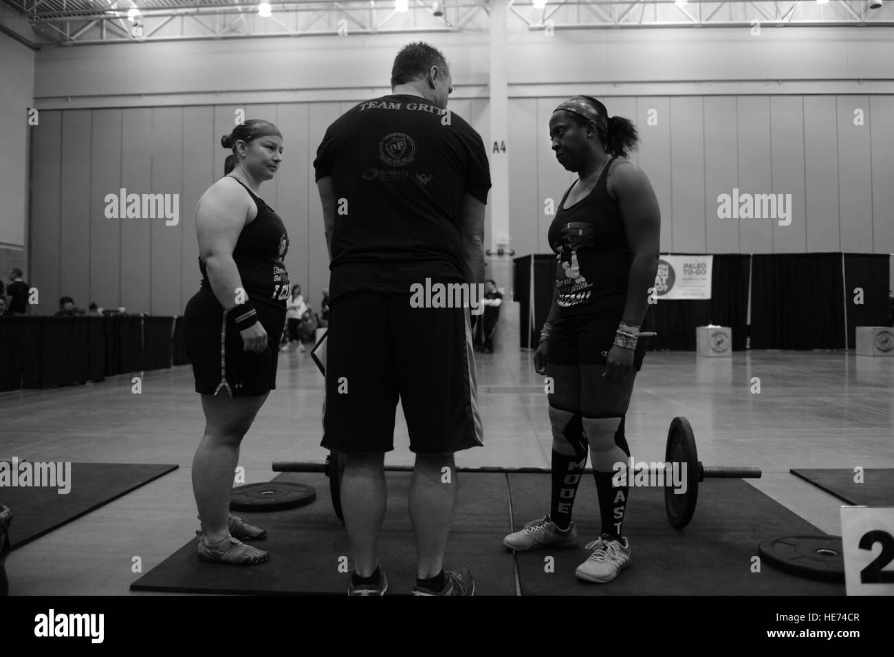 A TeamGrit CrossFit competition judge goes over rules for the first ...